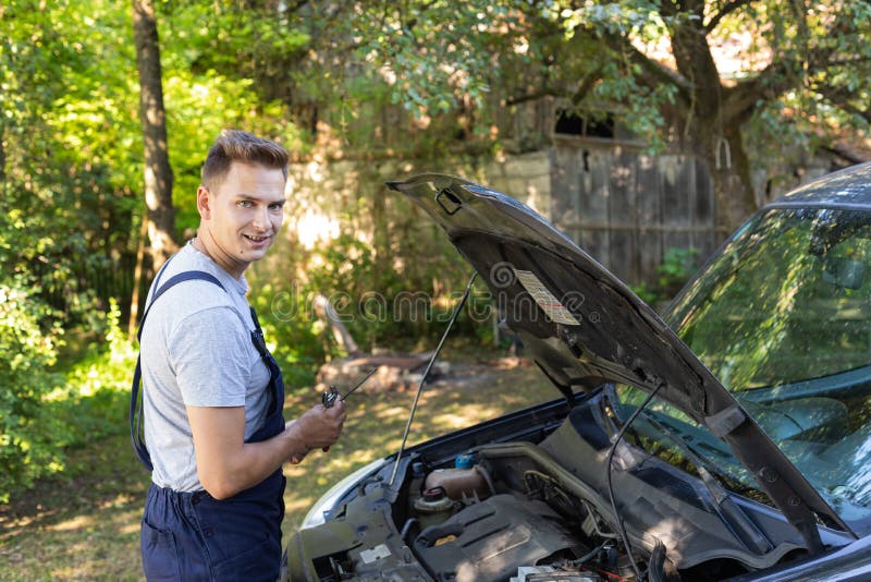 Broken car stock image. Image of motor, hood, person - 158031781