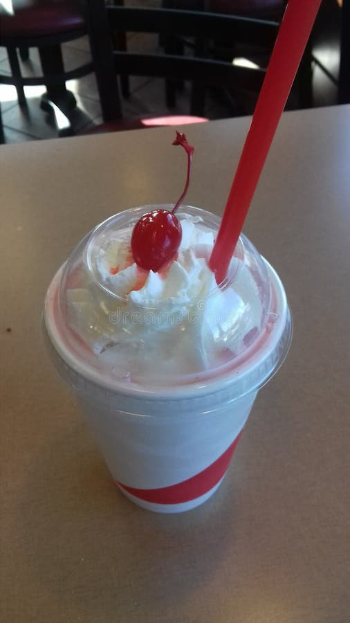 Milkshake with a Cherry stock image. Image of tasty - 115616797
