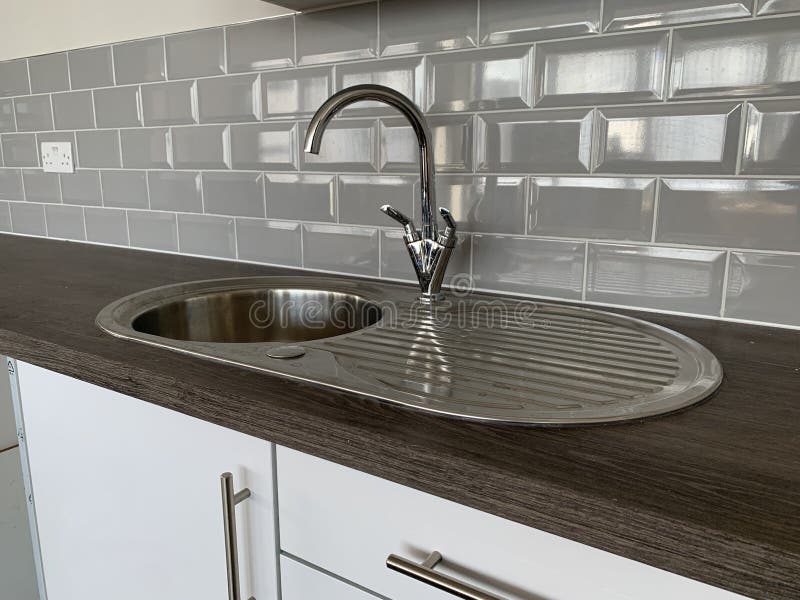 Picture of a Modern Metal Kitchen Office Sink and Countertop Stock ...
