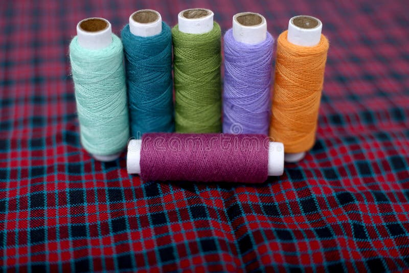 Picture of Multi Colored Sewing Thread on the Cloth Stock Image - Image ...