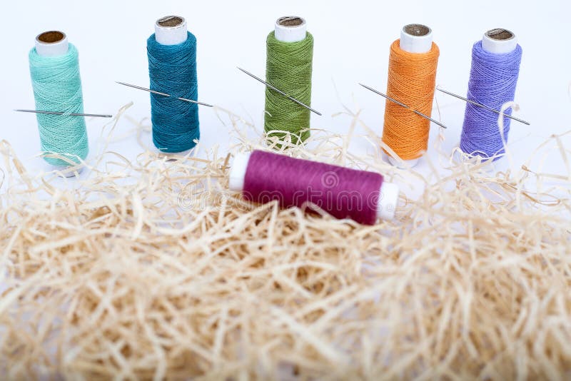 Picture of Multi Colored Sewing Thread on the Cloth Stock Image - Image ...