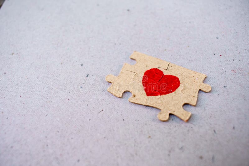 A Picture of a Paper Puzzle with a Red Heart Stock Image - Image of ...