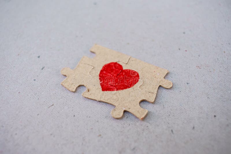 A Picture of a Paper Puzzle with a Red Heart Stock Image - Image of ...