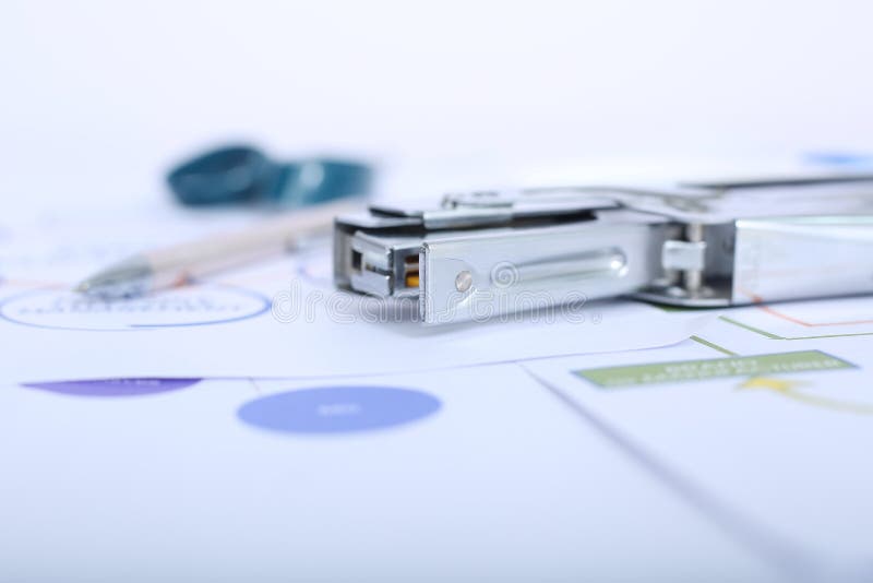 Picture of Pen and Stapler on the Office Paper Stock Photo - Image of ...