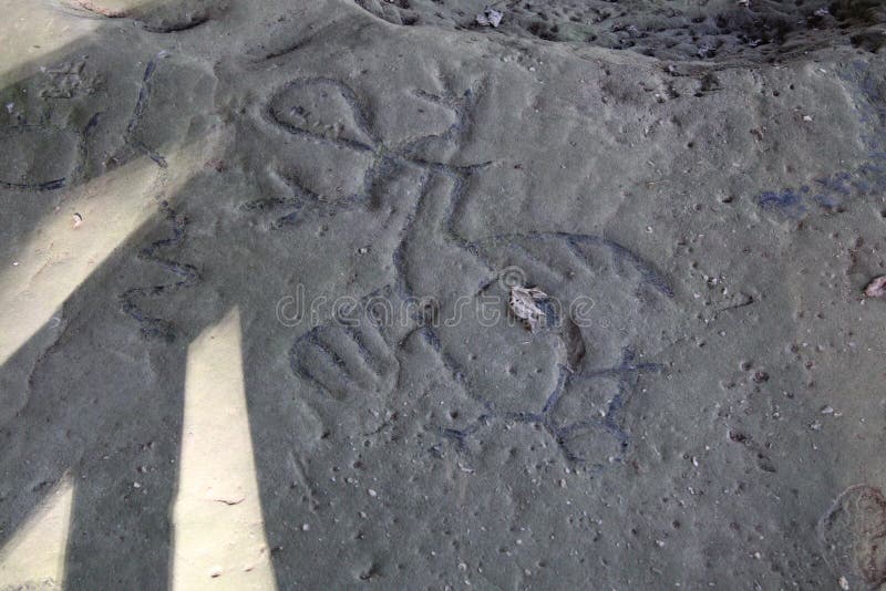 Sun Petroglyph Carved Into Sandstone Stock Image - Image of ...
