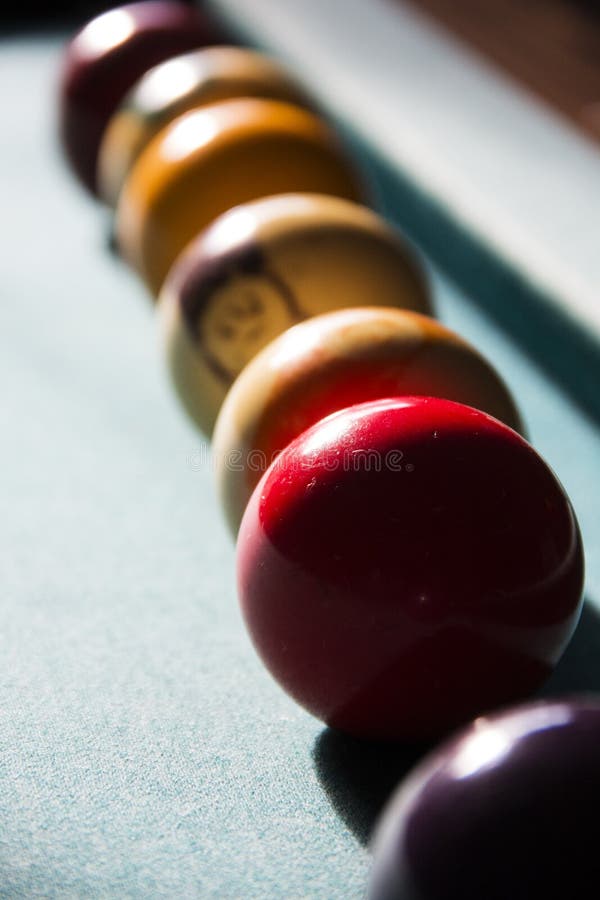 Pool Table Balls in a Row at a Billiard Hall Stock Photo - Image of ...