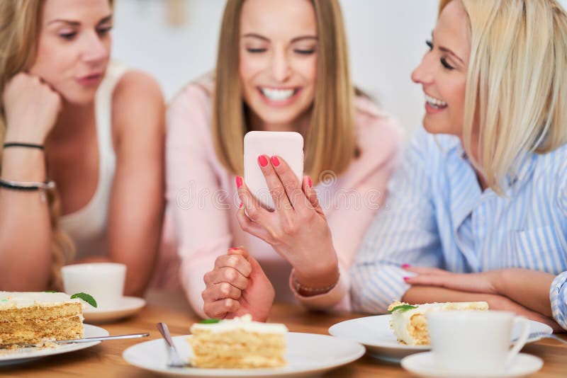 Picture Presenting Happy Group of Friends Using Smartphone Stock Photo ...