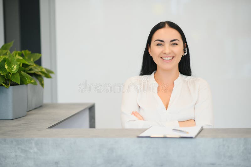 Picture of Pretty Receptionist at Work. Stock Photo - Image of manager ...