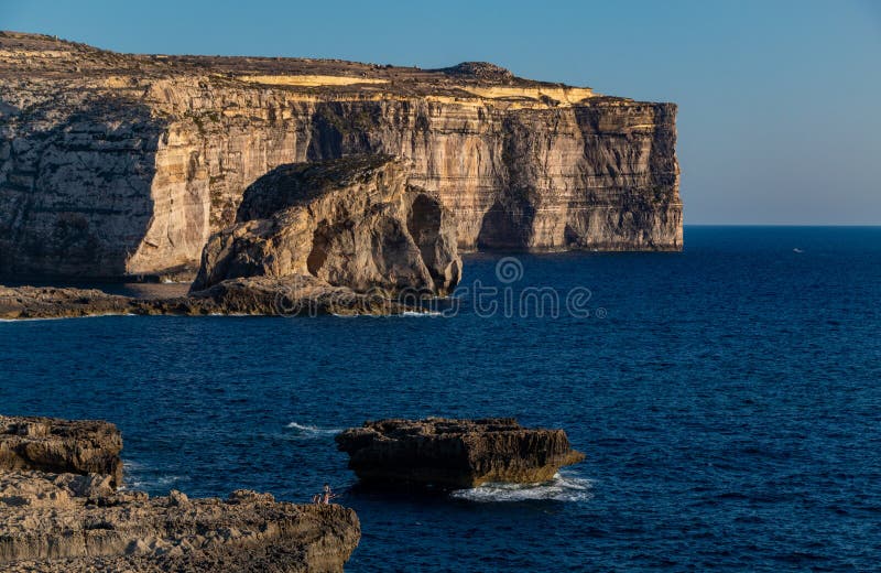 Gozo Cliffs Coastal stock photo. Image of water, sunset - 217542506