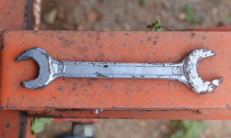 Rusted Wrench Over Corroded Iron Plate Stock Photo - Image of brown ...