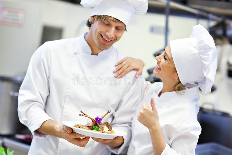 Busy Chefs at Work in the Restaurant Kitchen Stock Photo - Image of ...