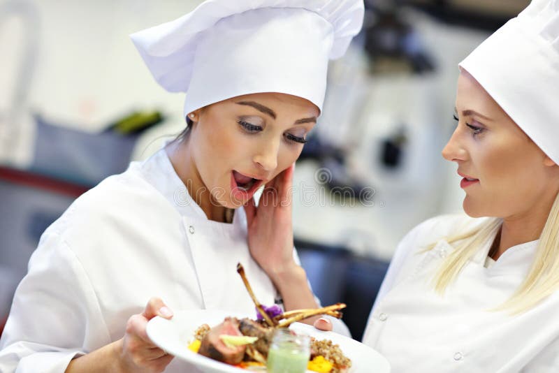 Busy Chefs at Work in the Restaurant Kitchen Stock Photo - Image of ...