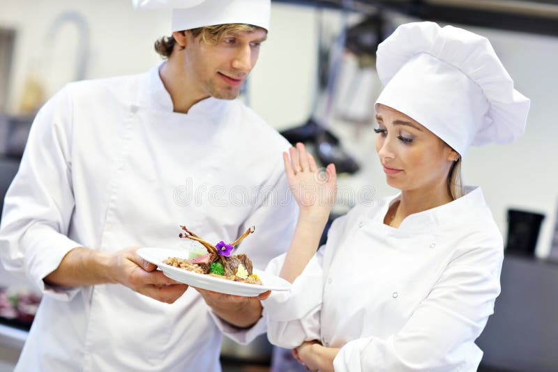Busy Chefs at Work in the Restaurant Kitchen Stock Photo - Image of ...