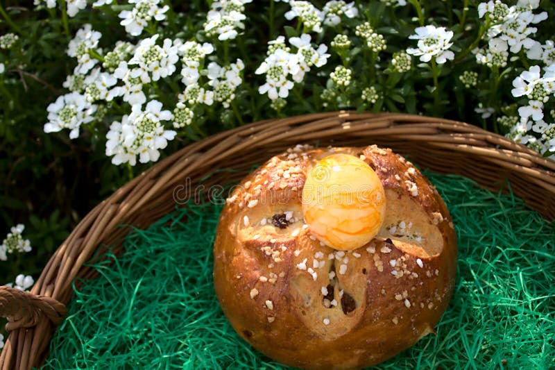 Easter Bread in Front of Beautiful Spring Flowers Stock Image - Image ...
