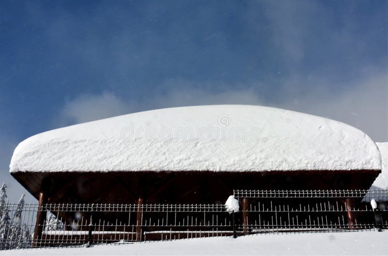 Picture of a Snowy Building Under the Sunlight Stock Photo - Image of ...