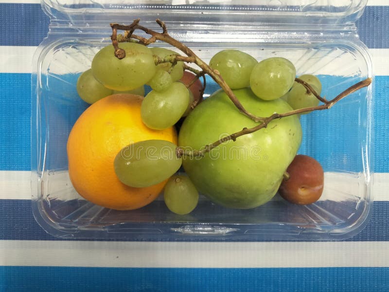 Picture of Some Fresh Fruit in a Container Stock Photo - Image of ...