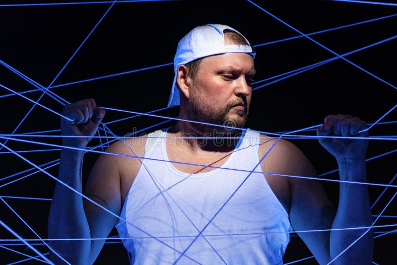 Picture of Stout Man with White Threads in Neon Light Stock Image ...