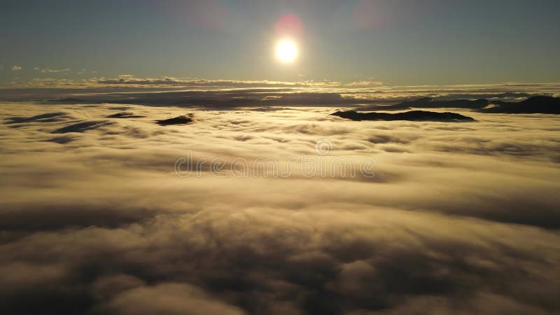 Picture of Sun Rising Above the Clouds Stock Photo - Image of rising ...