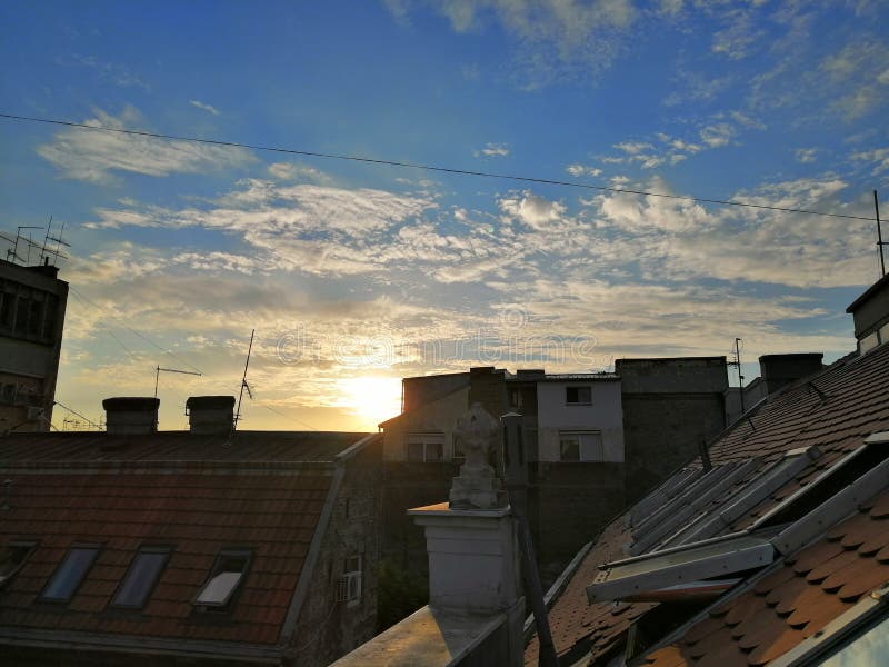 Sunny day in town stock image. Image of dawn, downtown - 182285173