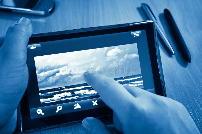 Picture on Tablet-pc Blue Toned Stock Photo - Image of touch, mobility ...