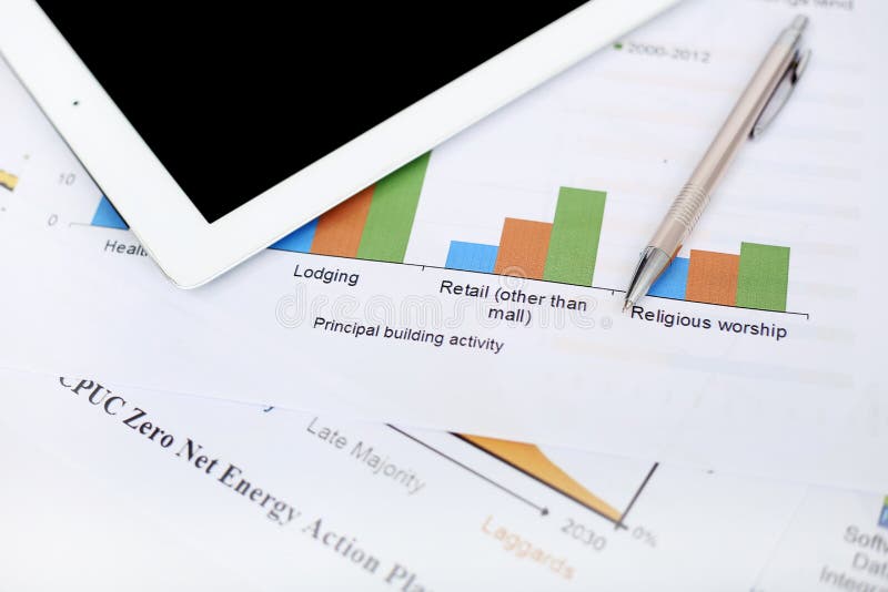 Picture of Tablet, Pen and Bar Graph Paper Stock Photo - Image of data ...