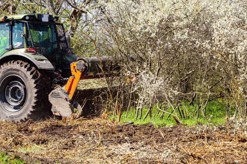 Picture of a Tractor Specialized in Forest Clearing that is in the ...