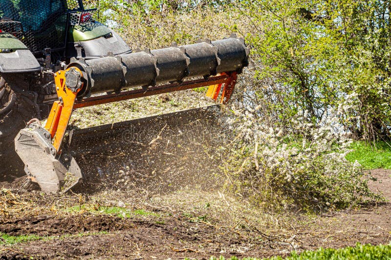 Picture of a Tractor Specialized in Forest Clearing that is in the ...