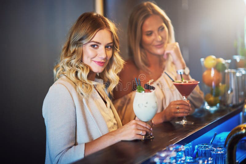 Two Girl Friends Having Drinks in Bar Stock Image - Image of love ...