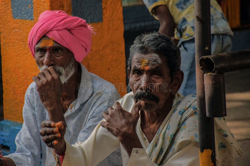Picture of Two Old Brothers Setting at Temple during the Indian Festive ...