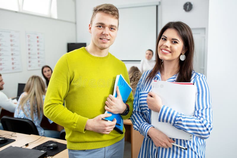 Picture of Two Students in the Classroom Stock Photo - Image of college ...