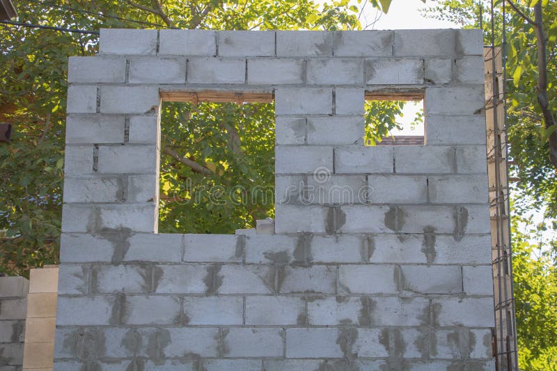A Picture of the Wall Frame Made from Concrete Cinder Blocks with Two ...