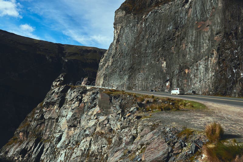 Picture of a White Car on a Road Next To the Huge Cliff Stock Image ...