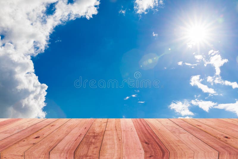 A Picture of a Wooden Desk in Front of an Abstract Sky Background Stock ...