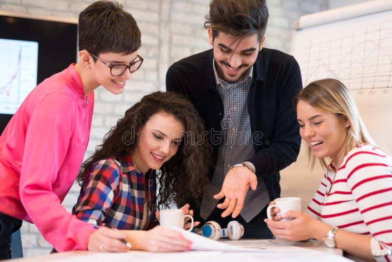 Picture of Young Architects Discussing in Office Stock Photo - Image of ...