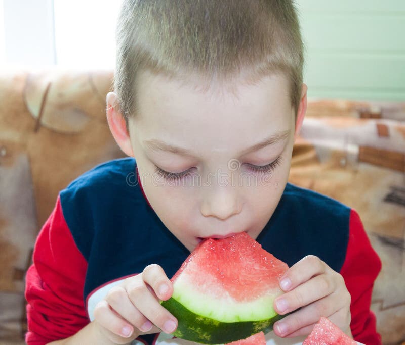 Picture of Young Boy and a Slice of Watermelon with Big Bite Marks ...