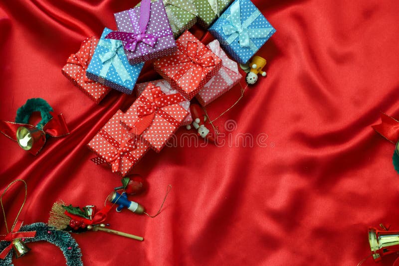 Christmas Gift Boxes on the Red Cloth Stock Image - Image of ribbon ...