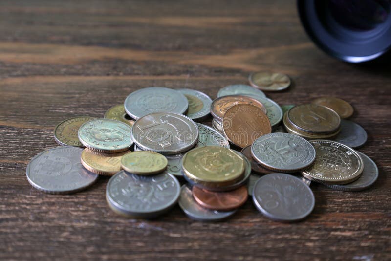 Coins from Various Countries with Camera Lens Stock Photo - Image of ...