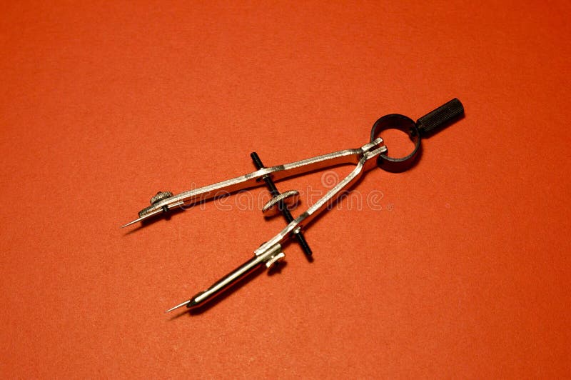 Pictured Compass Fixed on a Red Background Stock Photo - Image of metal ...