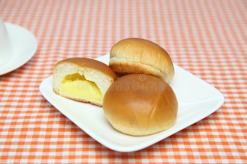 Cream buns on a plate stock photo. Image of food, sweet - 117334758