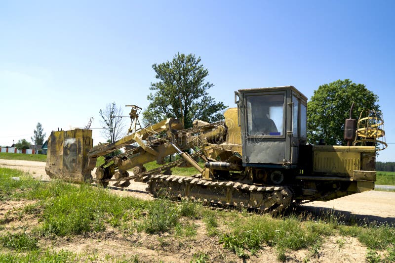 Digger Digs a Trench for Pipe Laying Stock Image - Image of hydraulic ...
