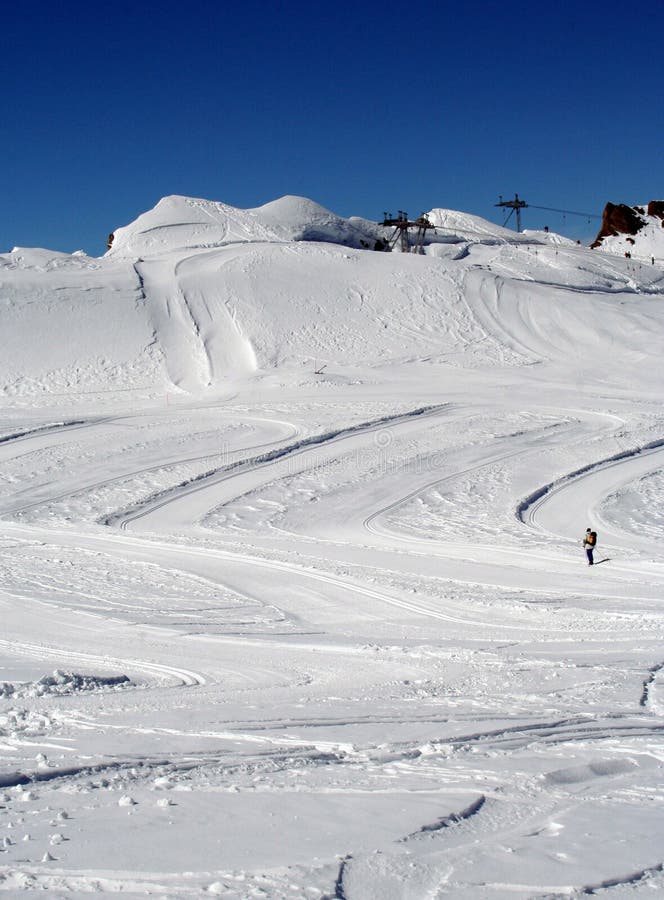 Alpine ski slope stock image. Image of skiers, lift, holiday - 14342093