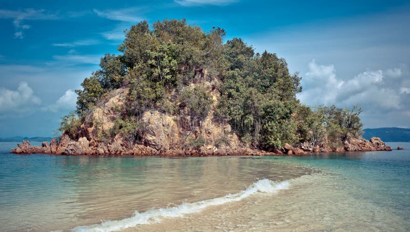 Picturesque Island and Beach Stock Photo - Image of seashore, rocks ...