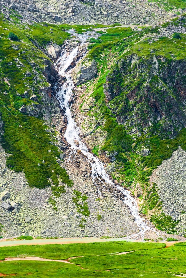 Picturesque Mountain Waterfall in Harsh Rocky Terrain. Stock Photo ...