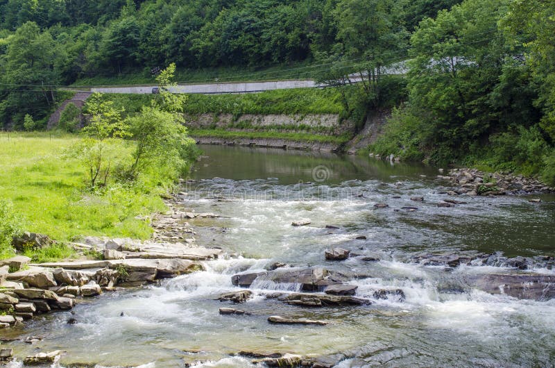 Mountain River with a Rapid Flow of Water Along the Rocks Stock Image ...
