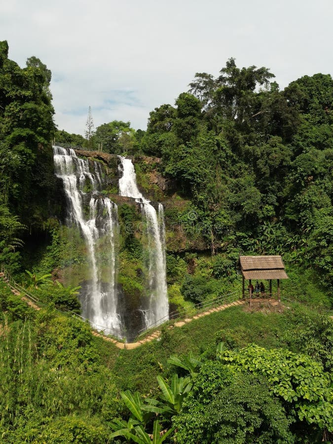 Picturesque Scene of a Cascading Waterfall in Pakse, Laos Stock Photo ...