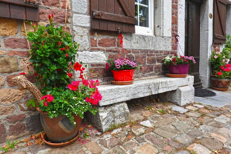 House Decorated with a Stone Bench and Flowers Stock Image - Image of ...