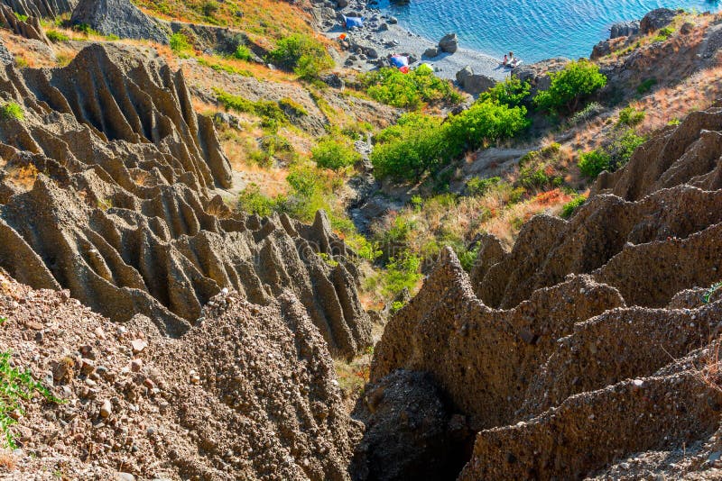 Picturesque steep beach 2 stock image. Image of hill - 153912925