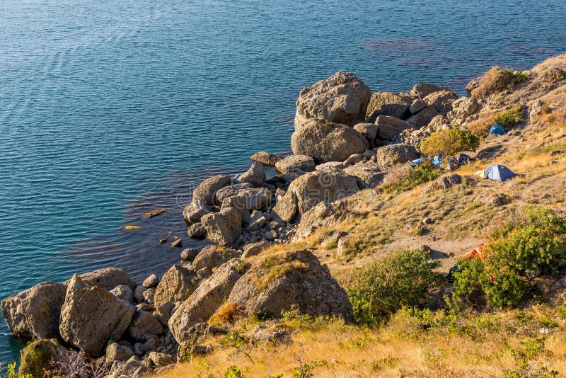 Picturesque steep beach stock photo. Image of tourism - 153912988