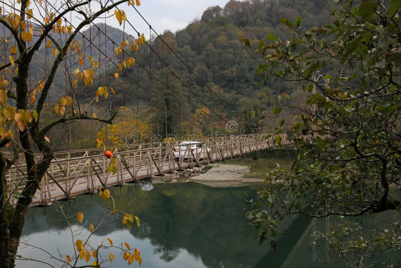 Picturesque View of Beautiful Bridge Over River and Trees in Mountains ...