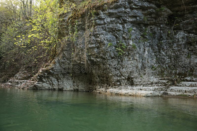 Picturesque View of Clean River Near Cliffs and Plants Outdoors Stock ...